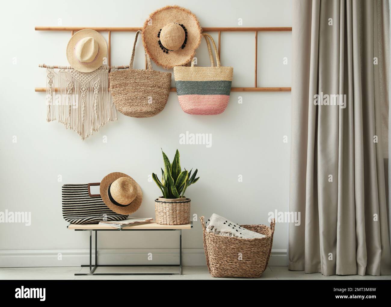 Decorative wooden ladder, bench and plant at home. Idea for interior ...