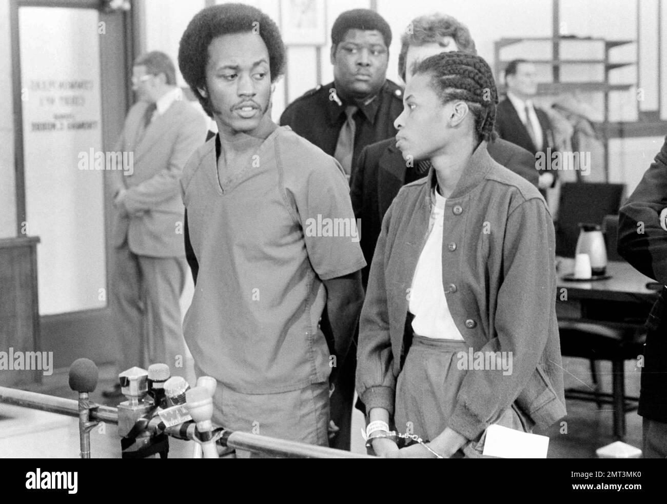 Alton Coleman and Debra Brown, both from Waukegan, Ill., look at each ...