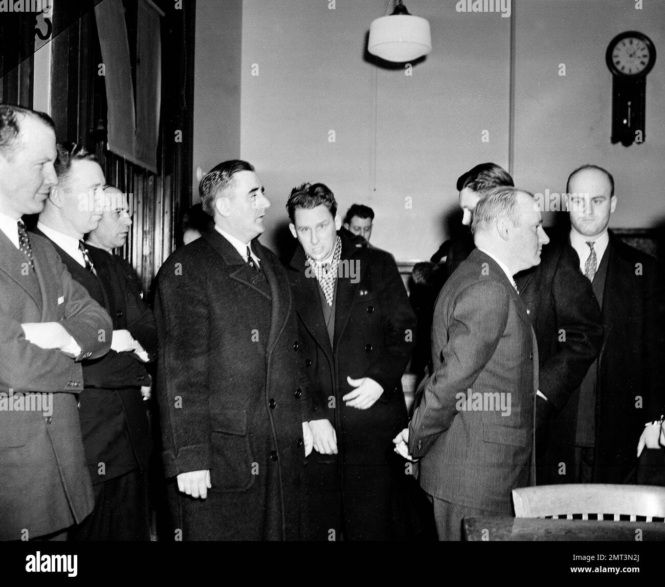 Percy "Angel Face" Geary,with checkered scarf, is shown at his ...