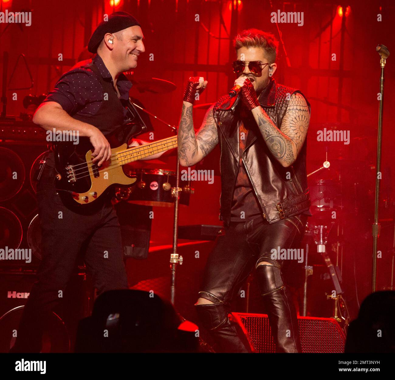 Danny Miranda, left, and Adam Lambert perform in concert with Queen ...