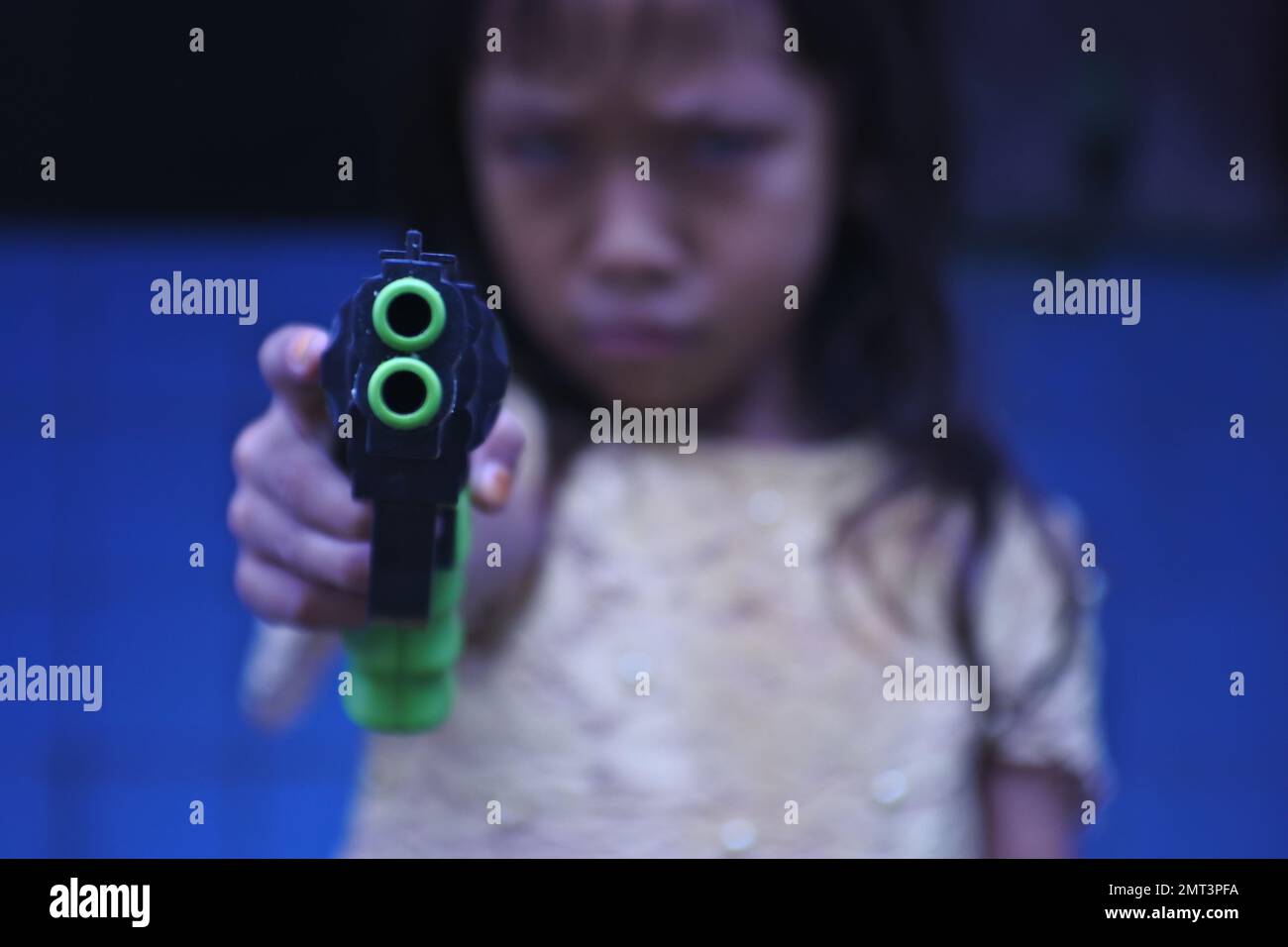 Girl pointing gun hi-res stock photography and images - Alamy