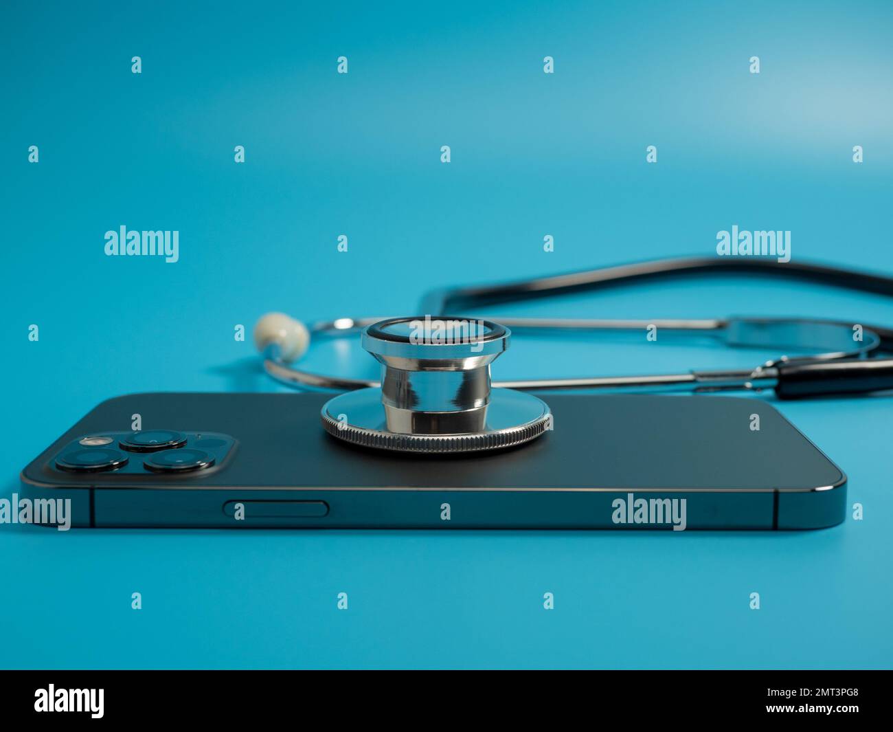 Smartphone and medical stethoscope. Smartphone diagnostics and repair ...