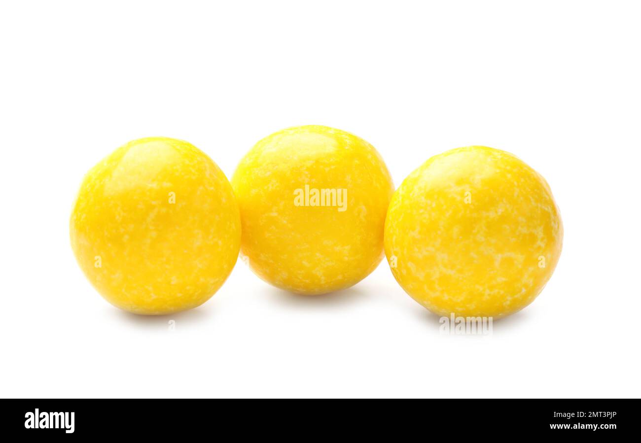 Tasty small lemon drops isolated on white Stock Photo - Alamy