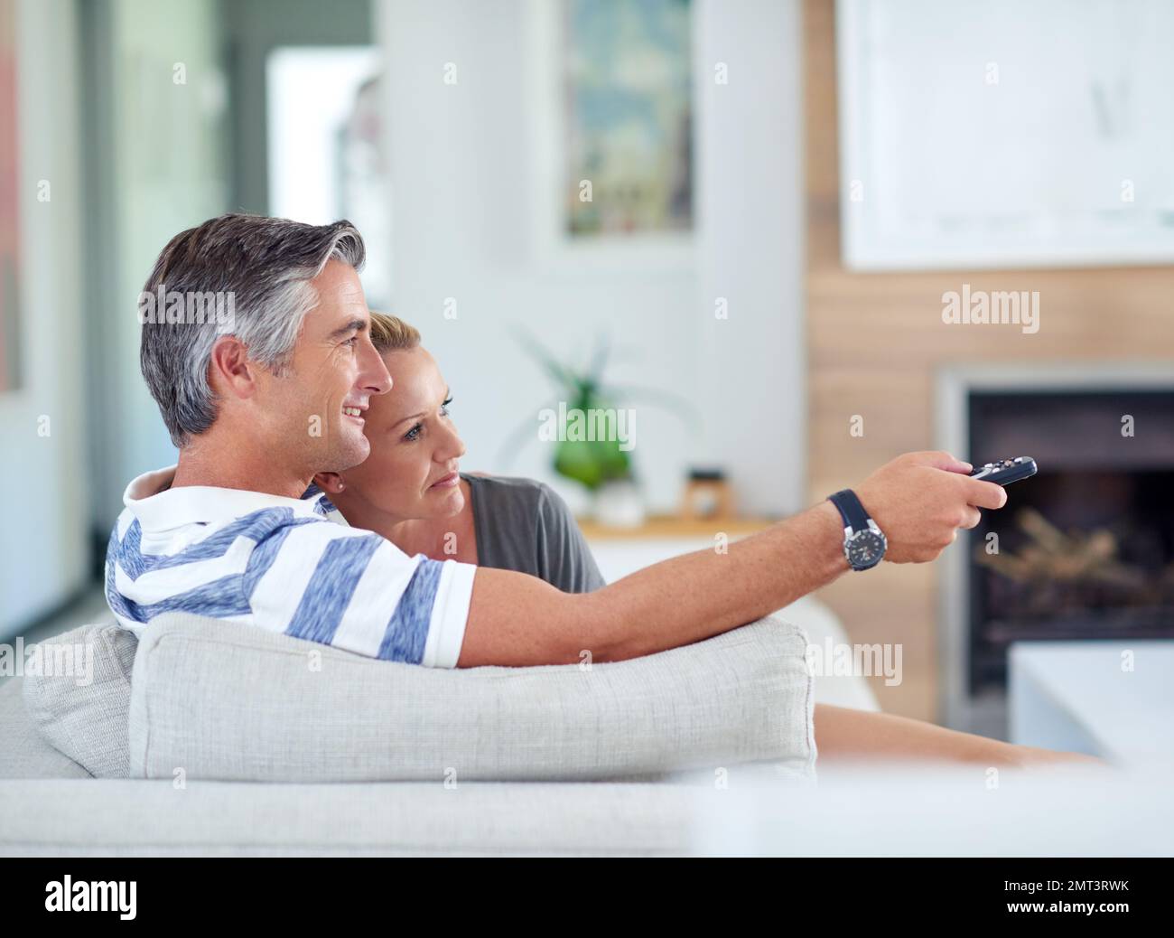 Movies and cuddles - the best weekend activities. mature couple ...