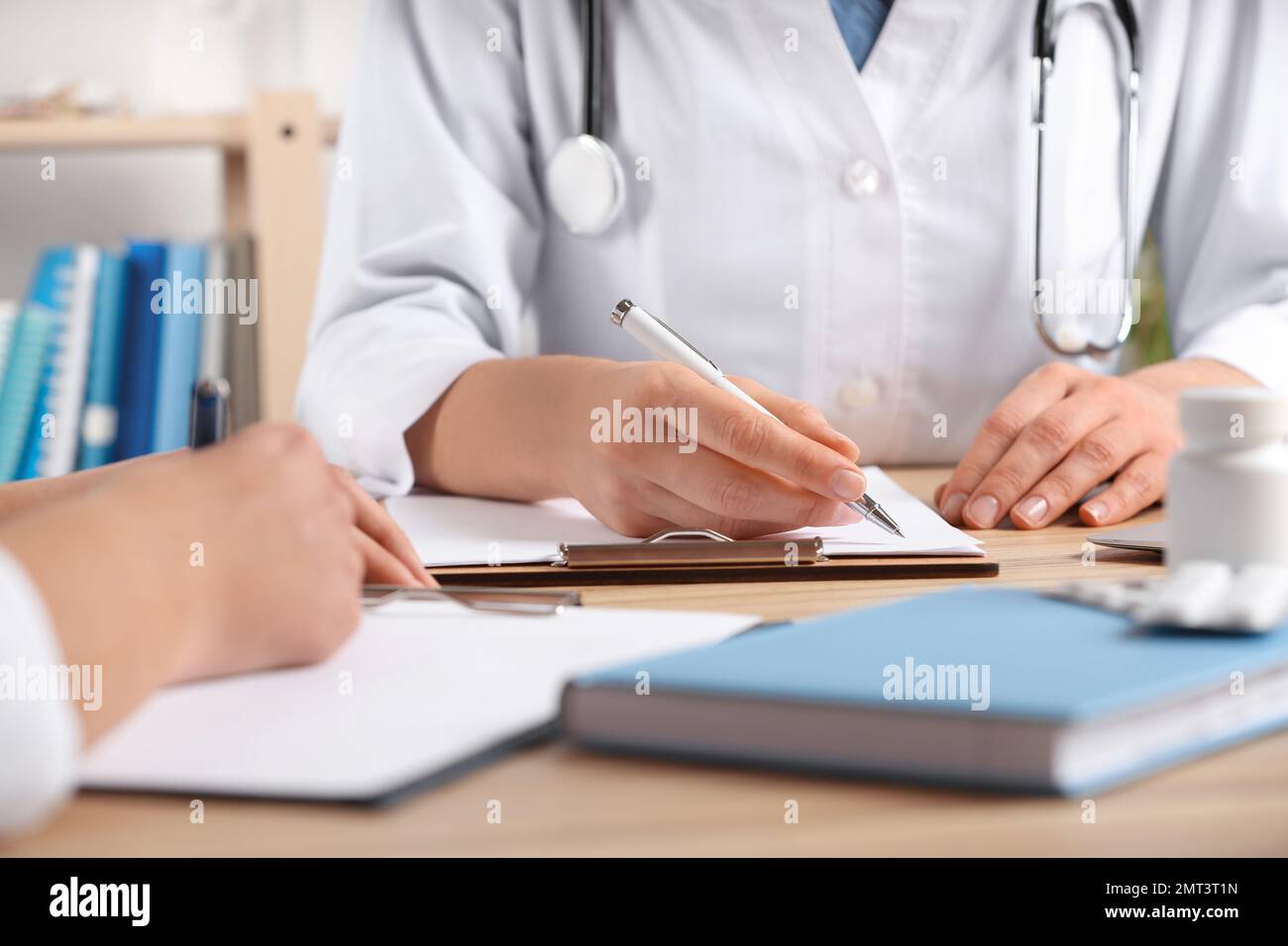 Closeup desk doctors office hi-res stock photography and images - Alamy