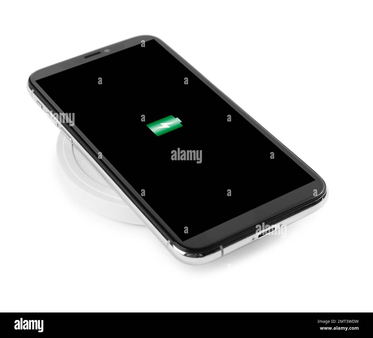 Mobile phone charging with wireless pad isolated on white Stock Photo ...