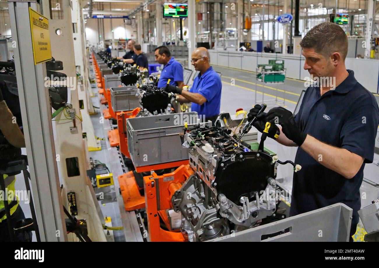 Ford employees assemble two liter diesel engines, called panther engine ...