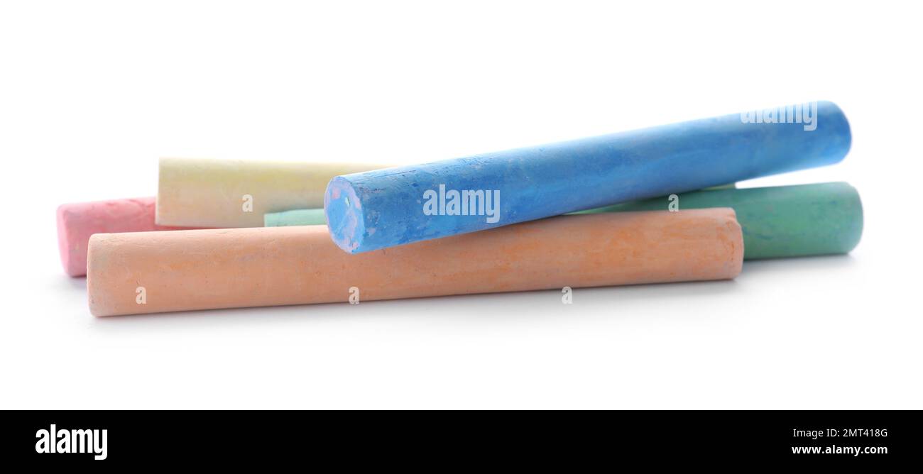 Color pieces of chalk on white background Stock Photo - Alamy