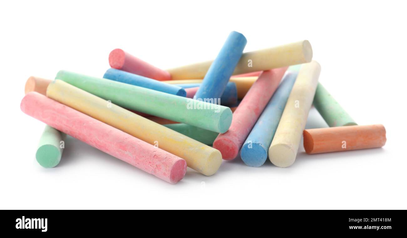 Color pieces of chalk on white background Stock Photo - Alamy