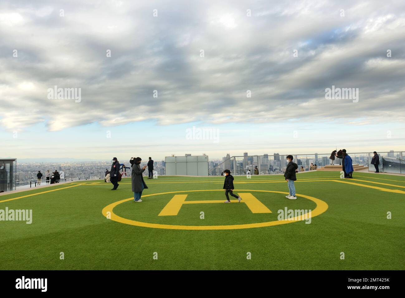 Tourist enjoying the views from the Shibuya Sky roof on top of the ...