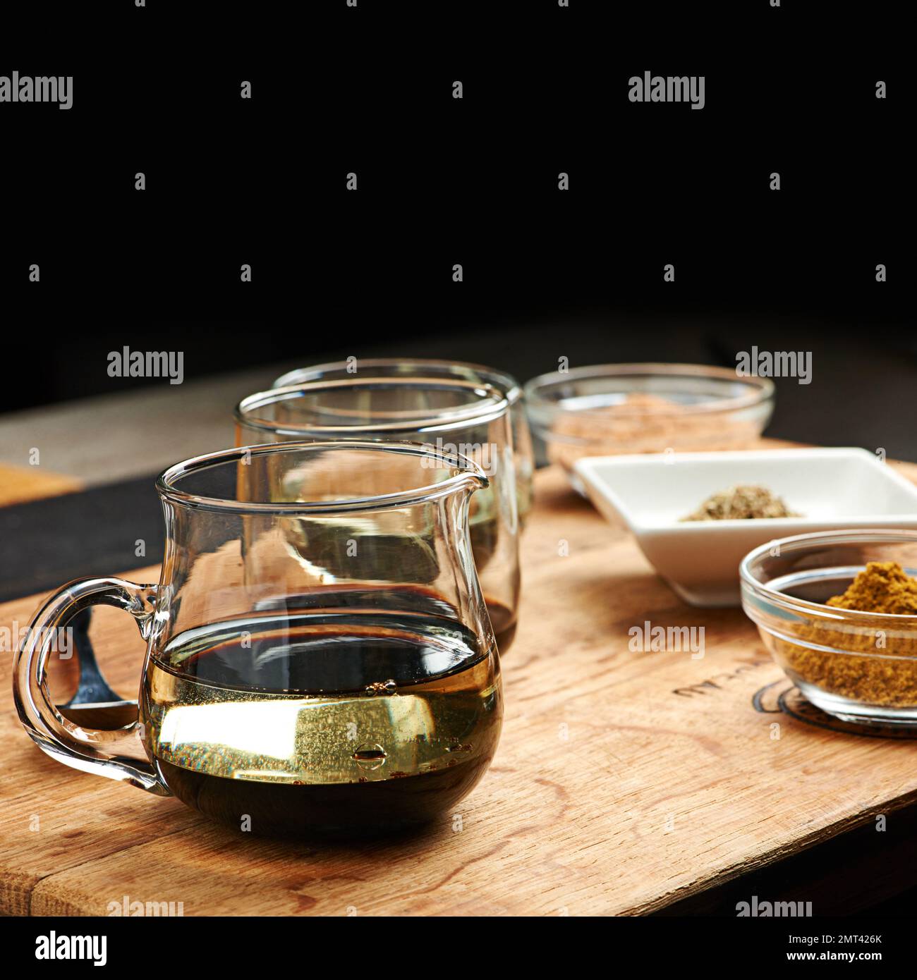 The perfect condiments. Studio shot of oil and condiments on a table ...