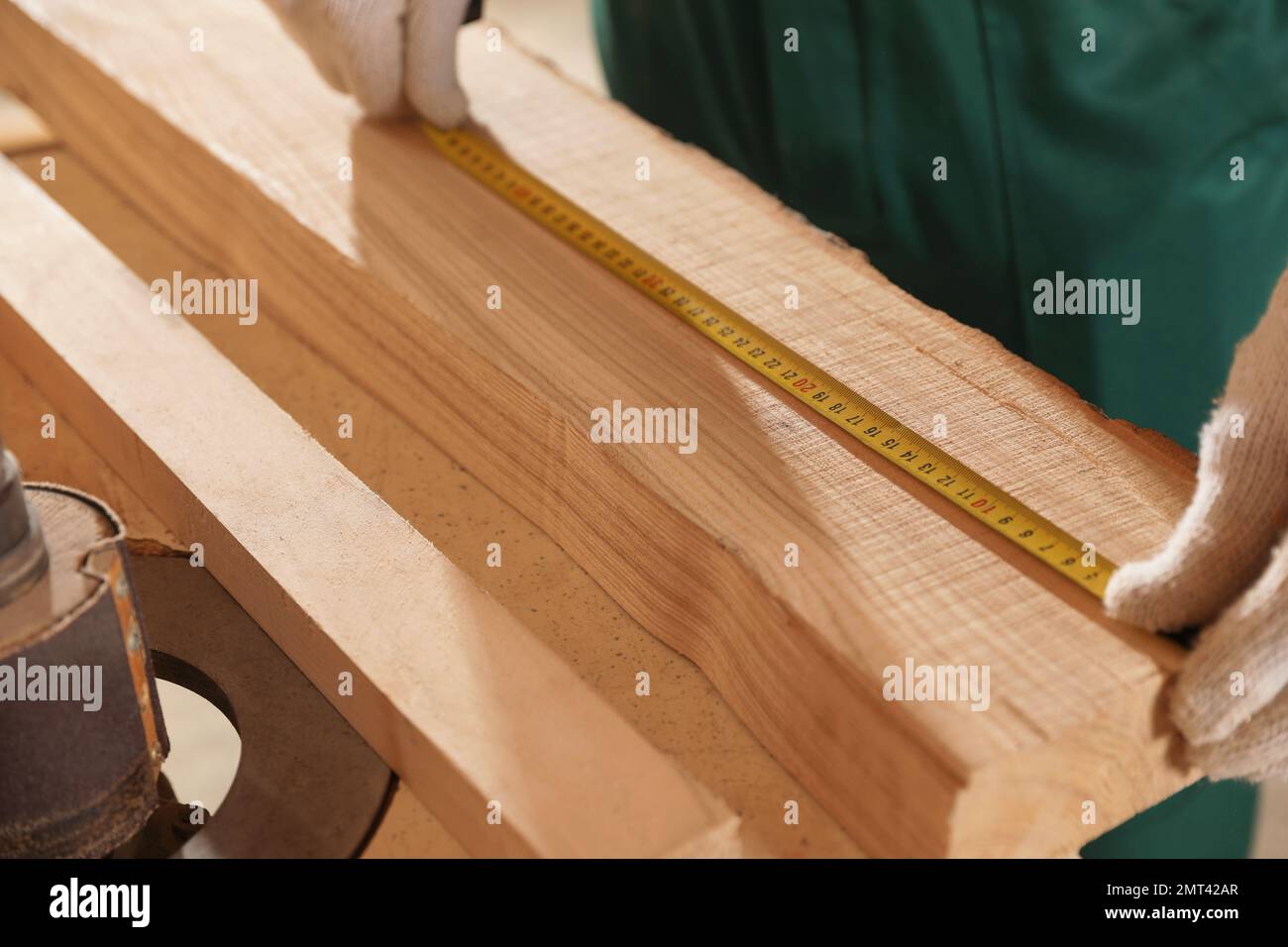 Closeup construction worker measuring board hi-res stock photography ...