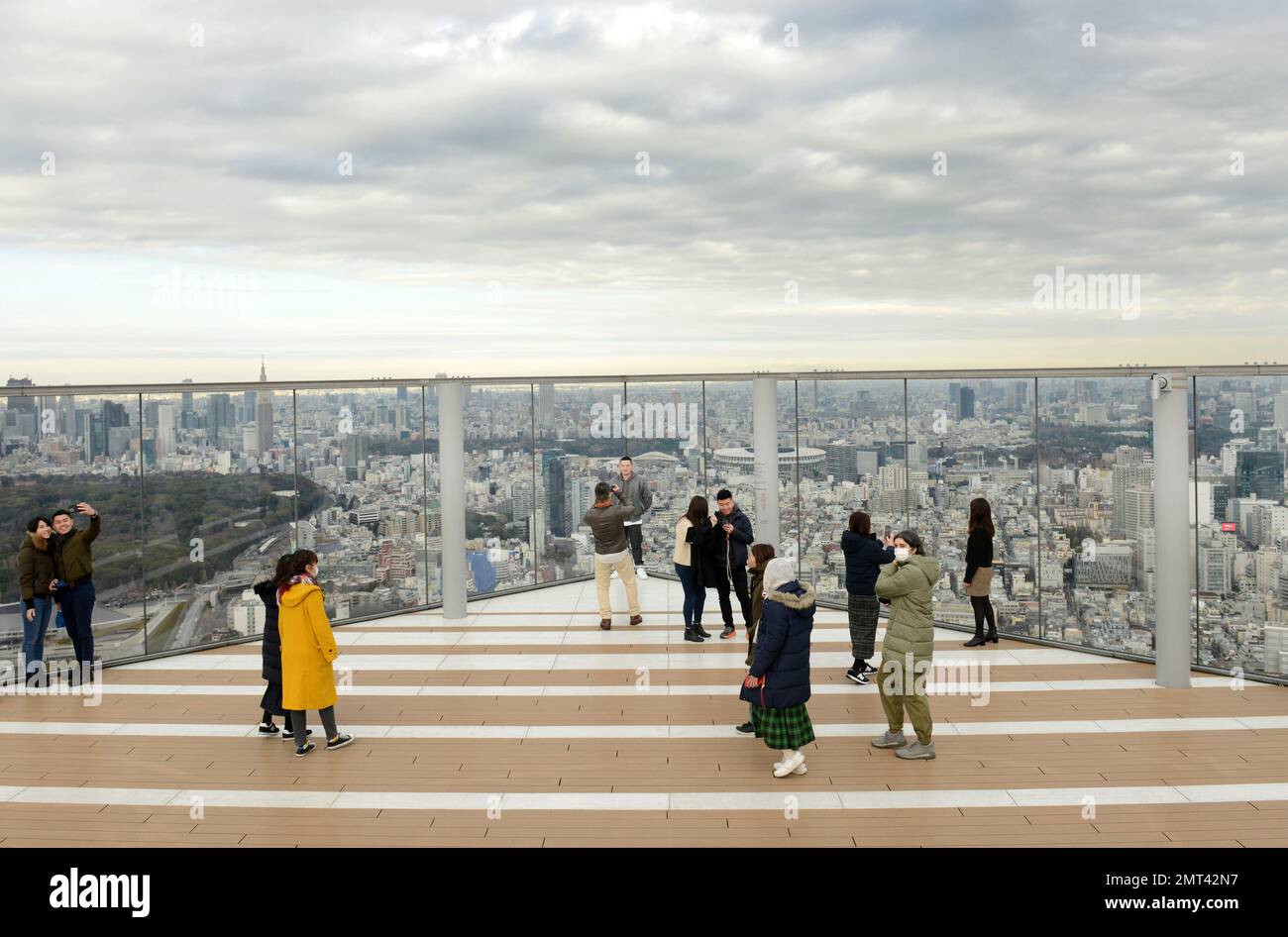 Tourist enjoying the views from the Shibuya Sky roof on top of the ...