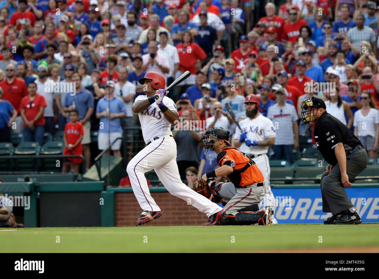 Texas Rangers' Adrian Beltre follows through on a ground out as ...
