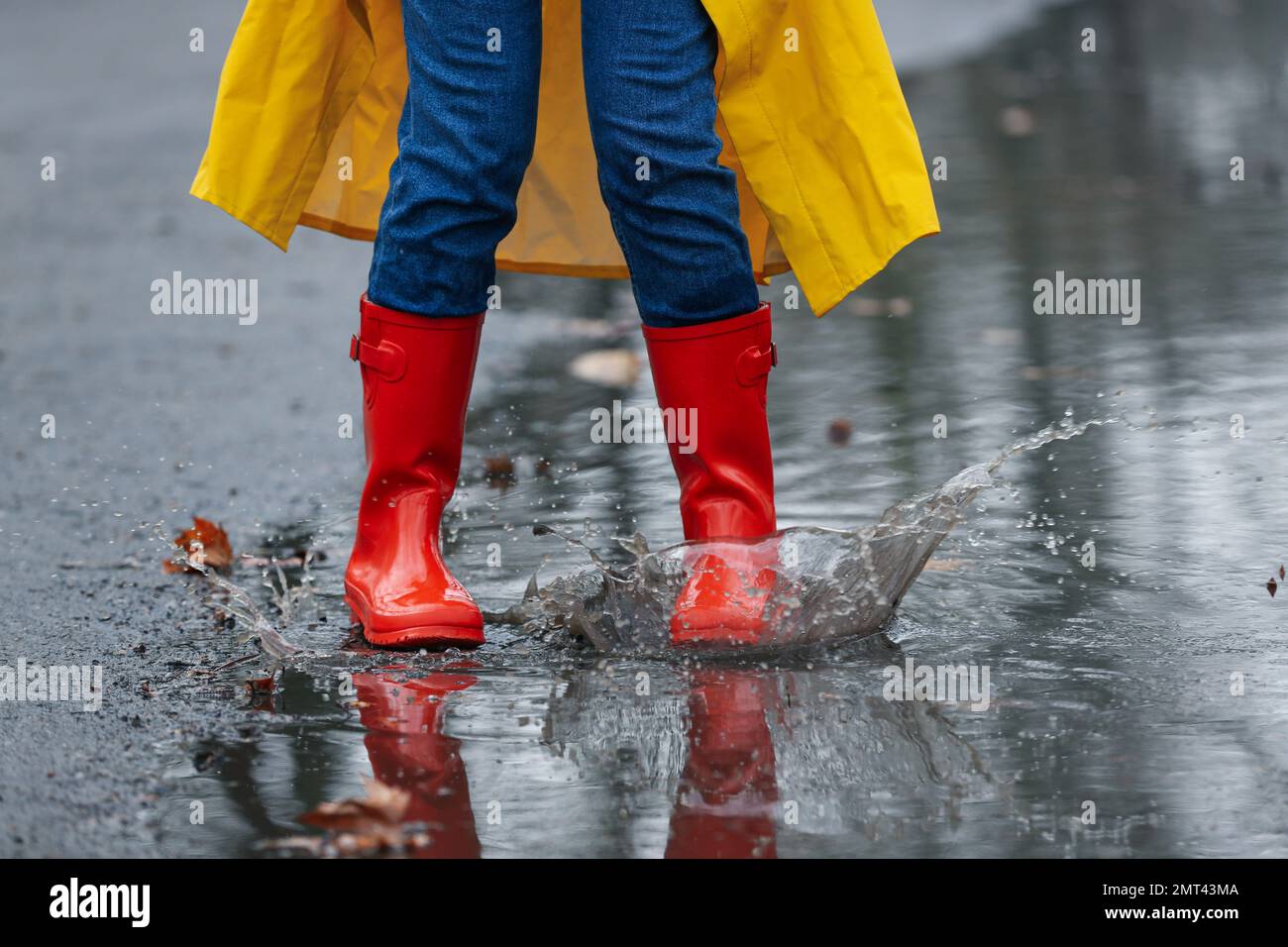 Rainy day puddle fun hi-res stock photography and images - Alamy