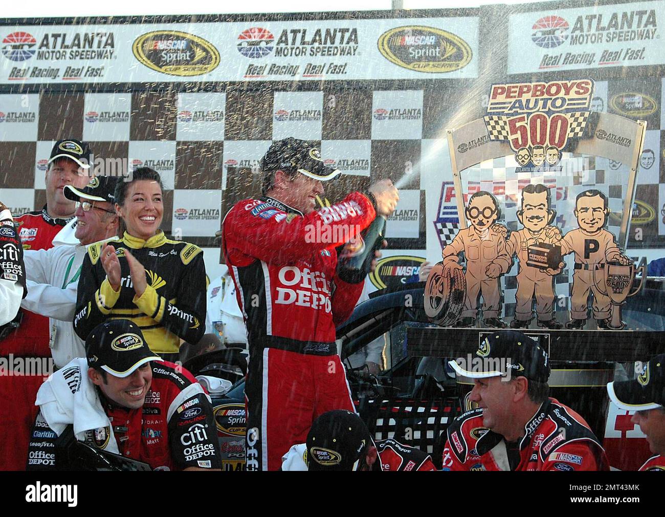 Monica Palumbo, Miss Sprint Cup, celebrates with Carl Edwards in ...
