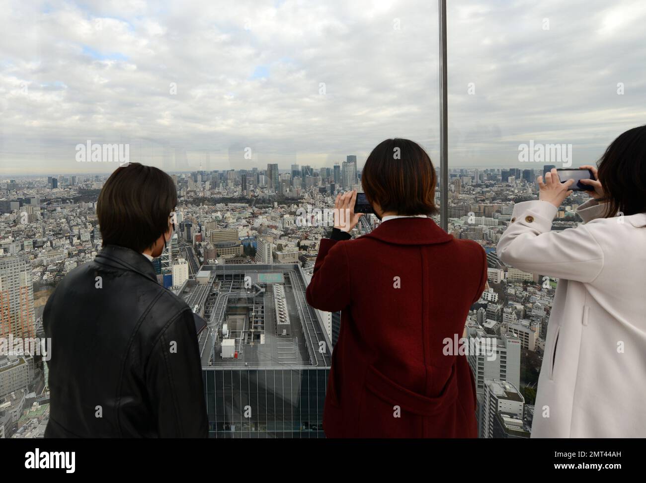 Tourist enjoying the views from the Shibuya Sky roof on top of the ...