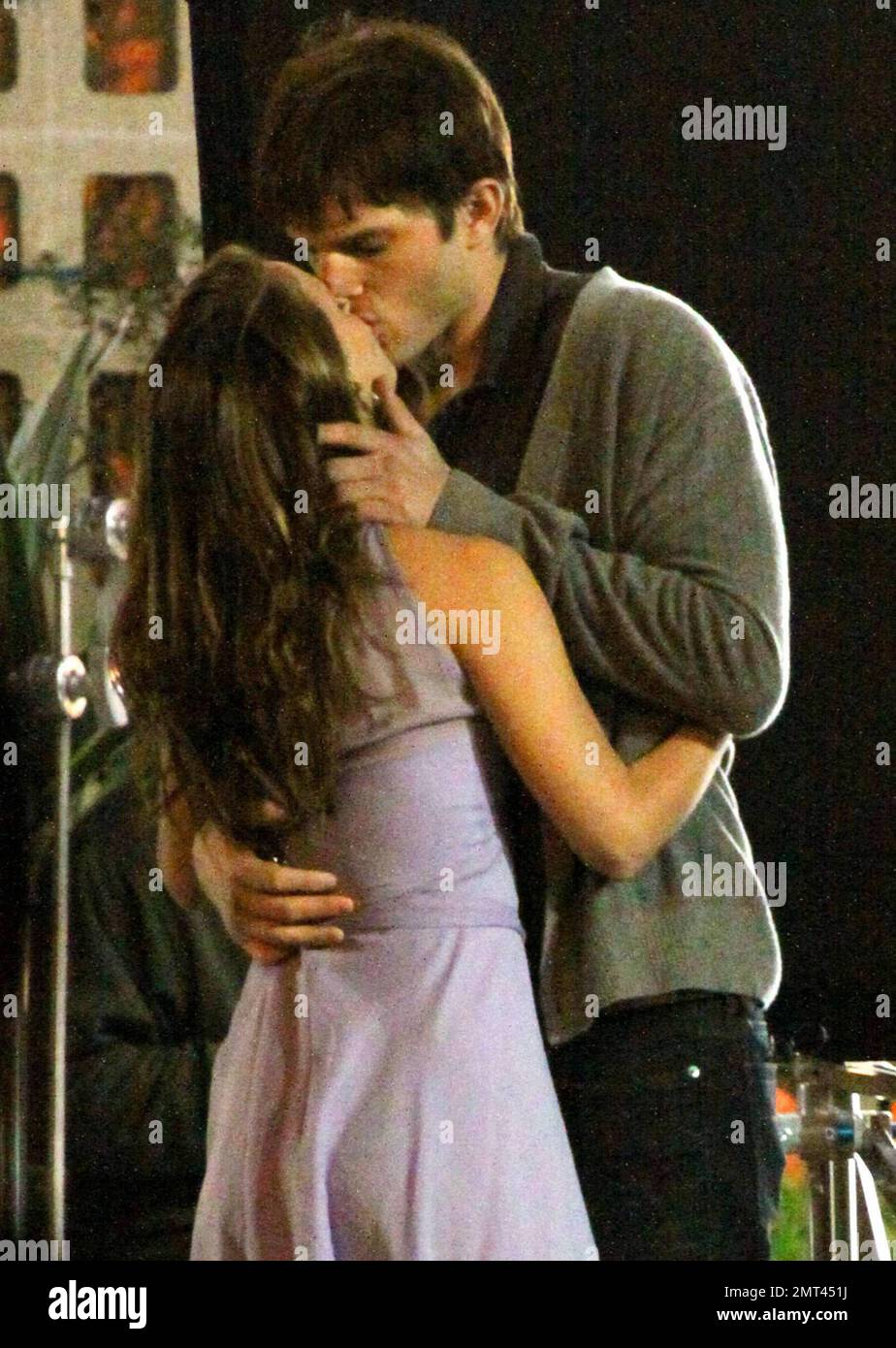 Actress Natalie Portman and actor Ashton Kutcher share a passionate kiss on the set of "No ...