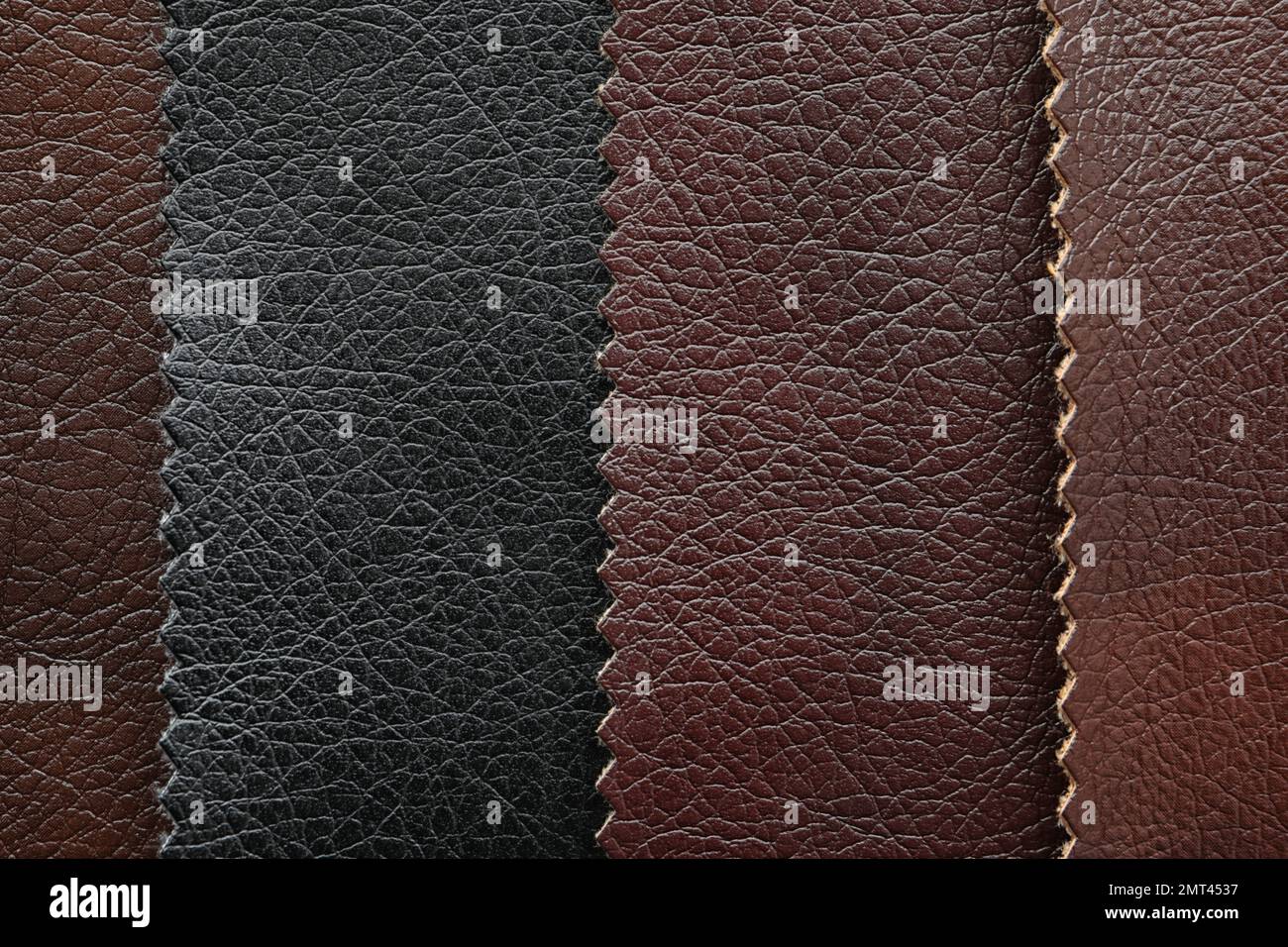 Leather samples of different colors for design as background, closeup ...