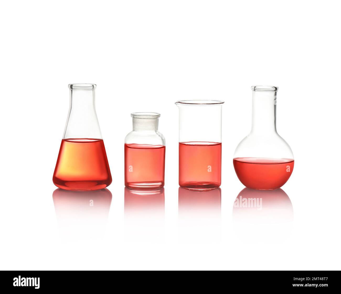Different laboratory glassware with red liquid isolated on white Stock ...