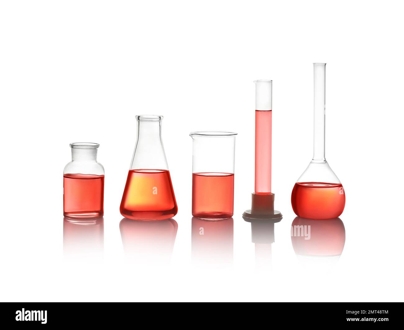 Different laboratory glassware with red liquid isolated on white Stock ...