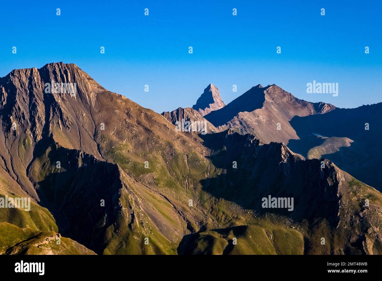 High alpine landscape with craters, mountains and ridges of the French ...
