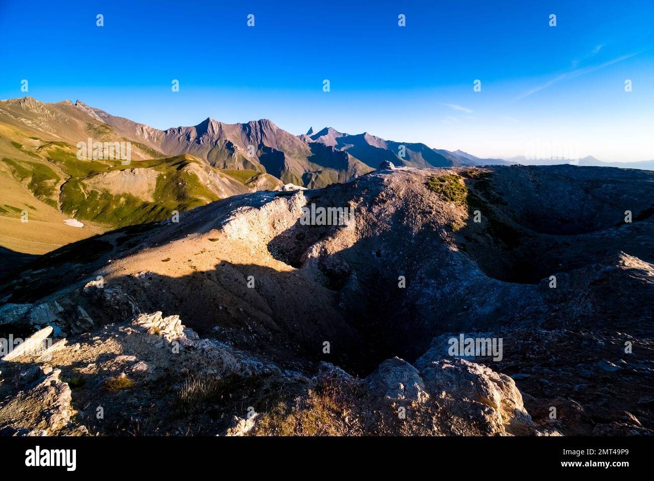 High alpine landscape with craters, mountains and ridges of the French ...