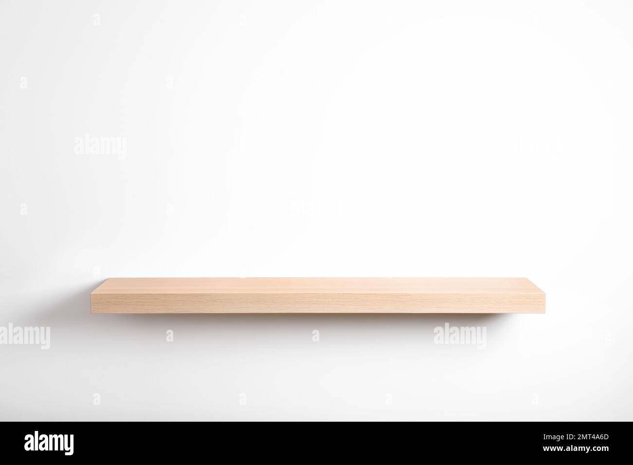 Empty stylish wooden shelf isolated on white Stock Photo - Alamy