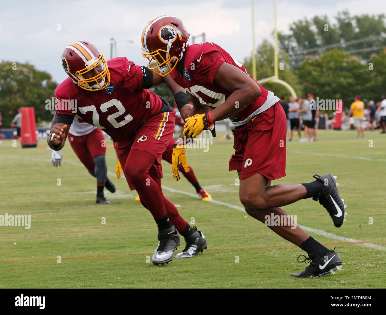 Washington Redskins defensive lineman Kevin Bowen (72) and Washington ...