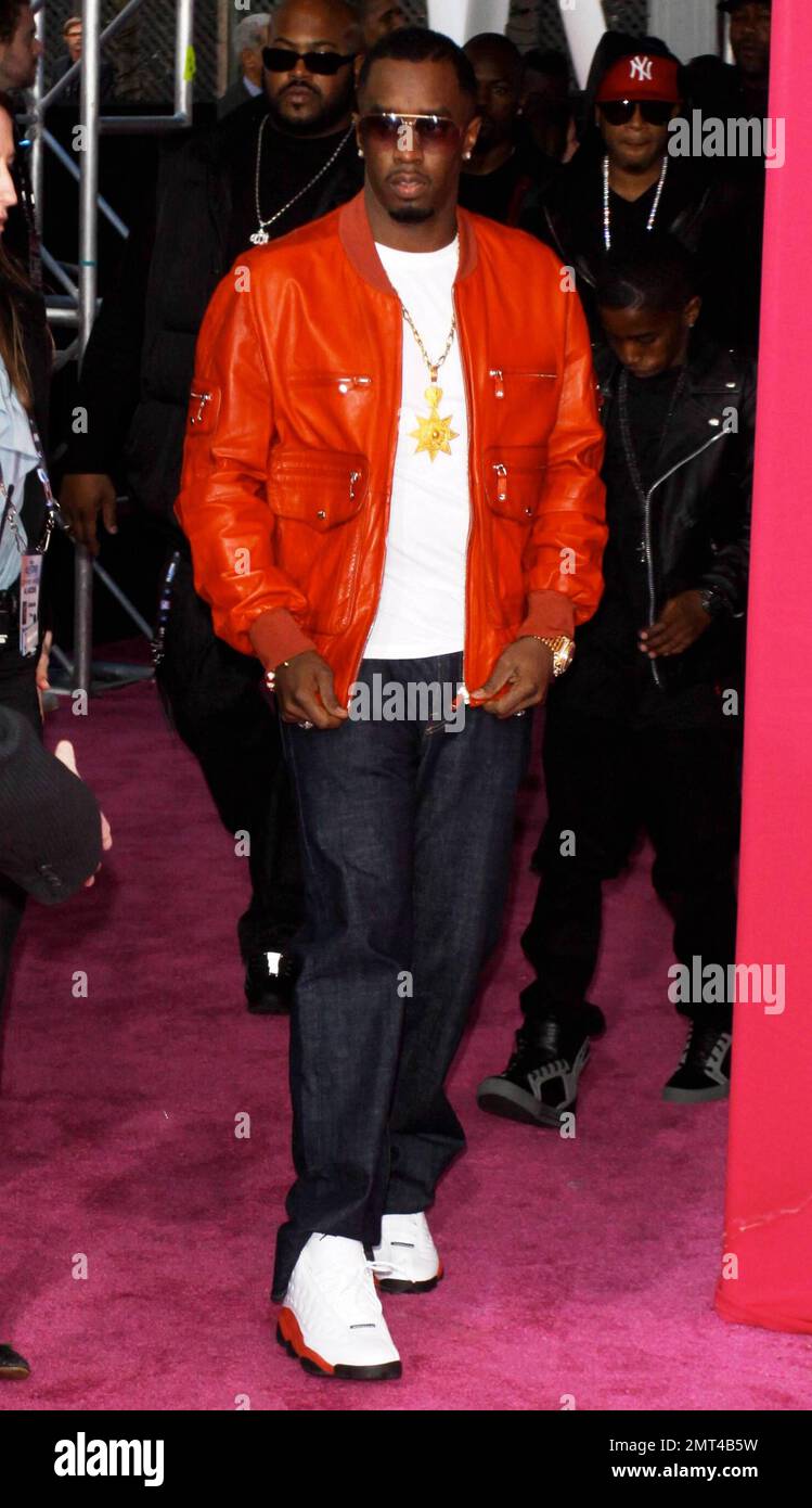 Sean Combs (aka Diddy) poses for photographers on the pink carpet ahead ...