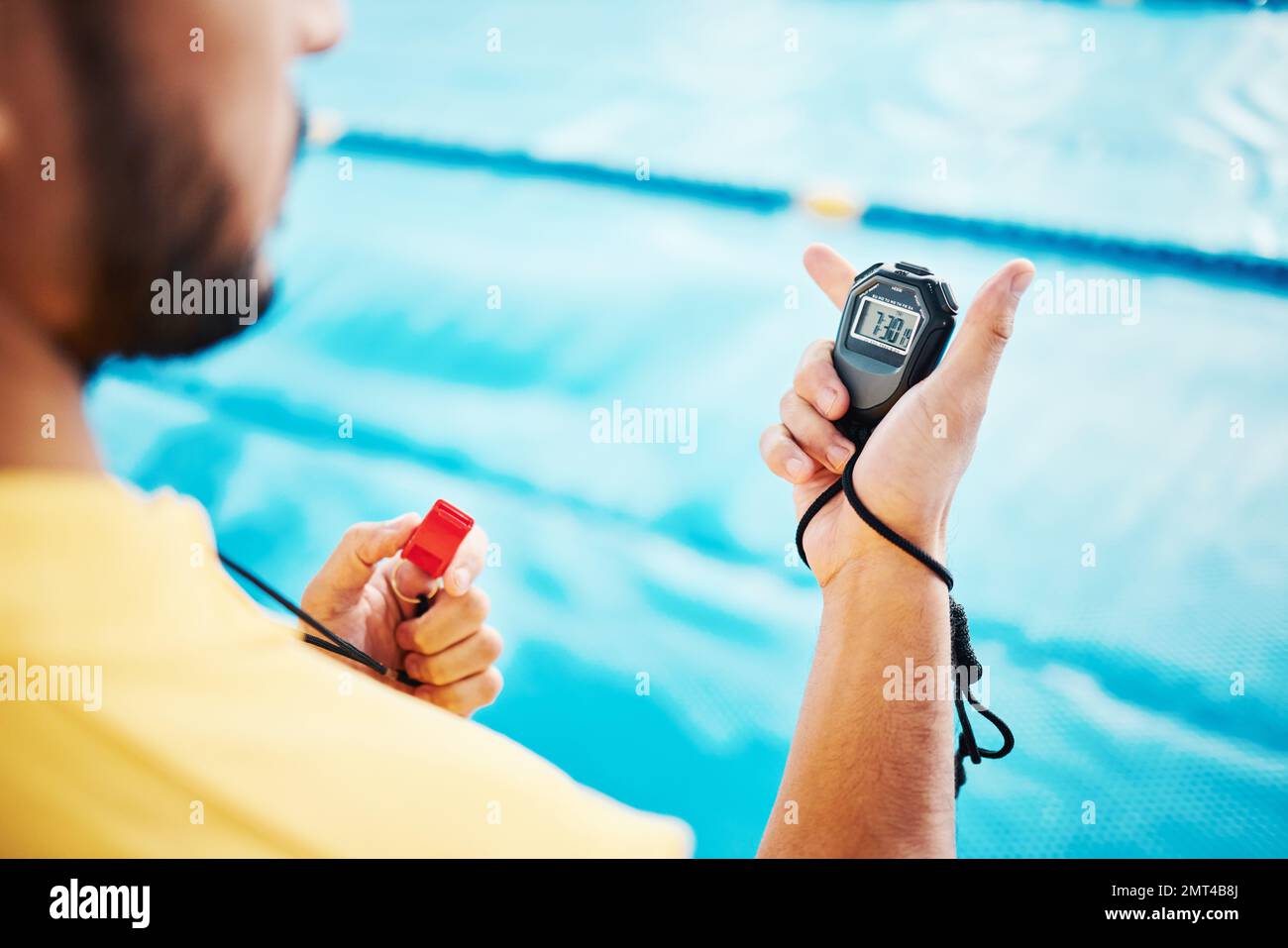 Coach, swimming pool and timer in hands for training, water exercise ...
