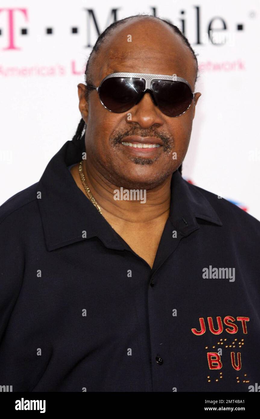 Musician Stevie Wonder poses for photographers on the pink carpet ahead ...