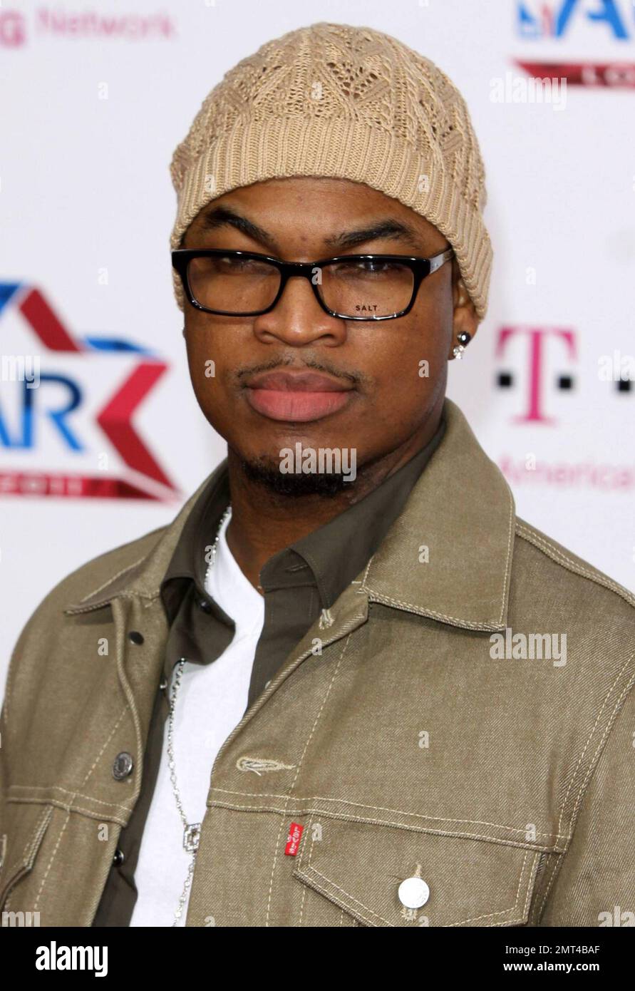 Singer Ne-Yo poses for photographers on the pink carpet ahead of the ...