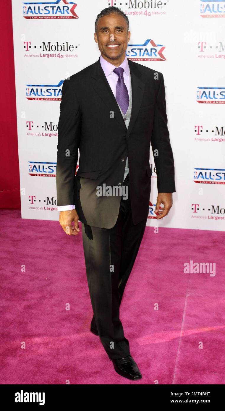 Former NBA player Rick Fox poses for photographers on the pink carpet ...