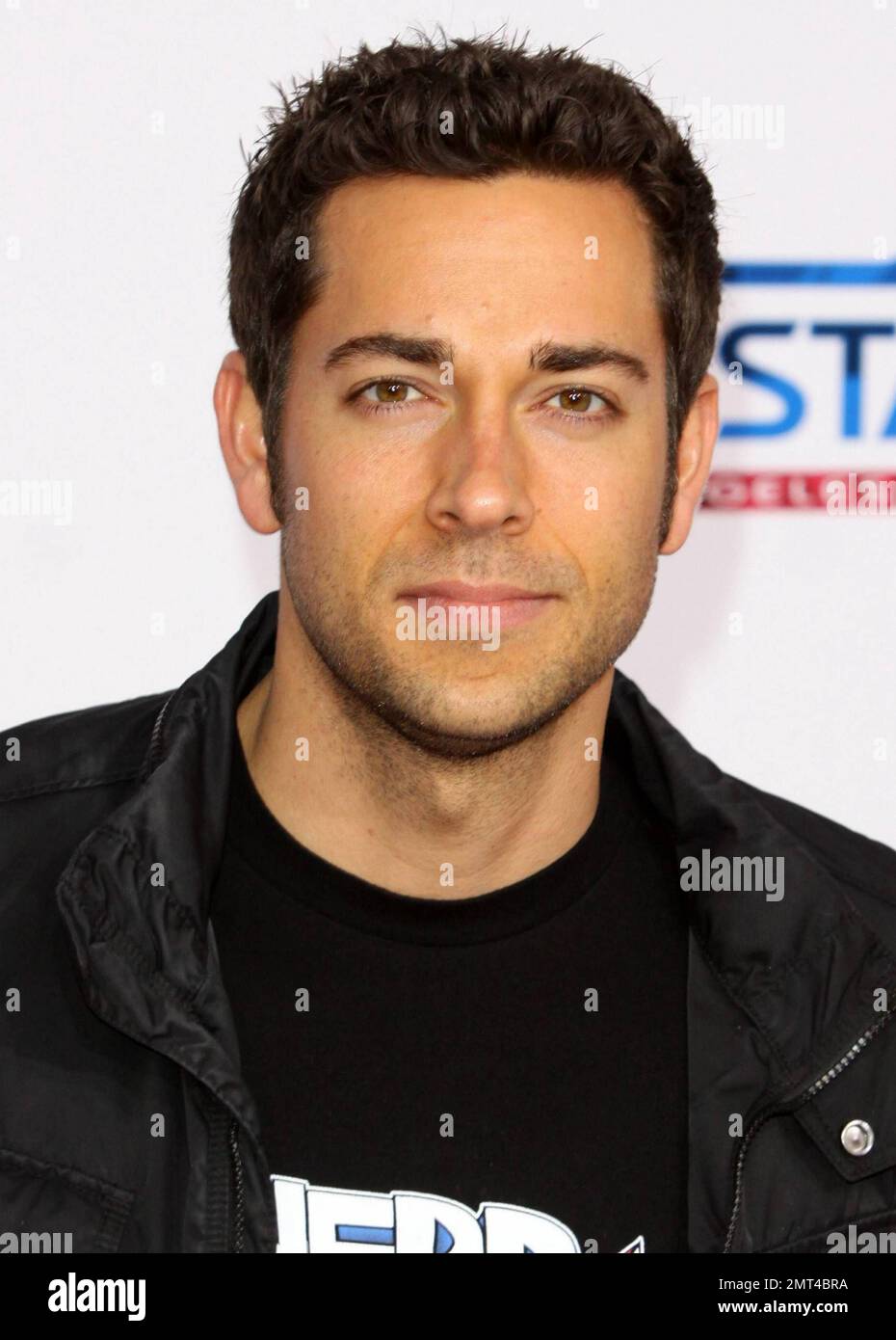 Actor Zachary Levi poses for photographers on the pink carpet ahead of ...