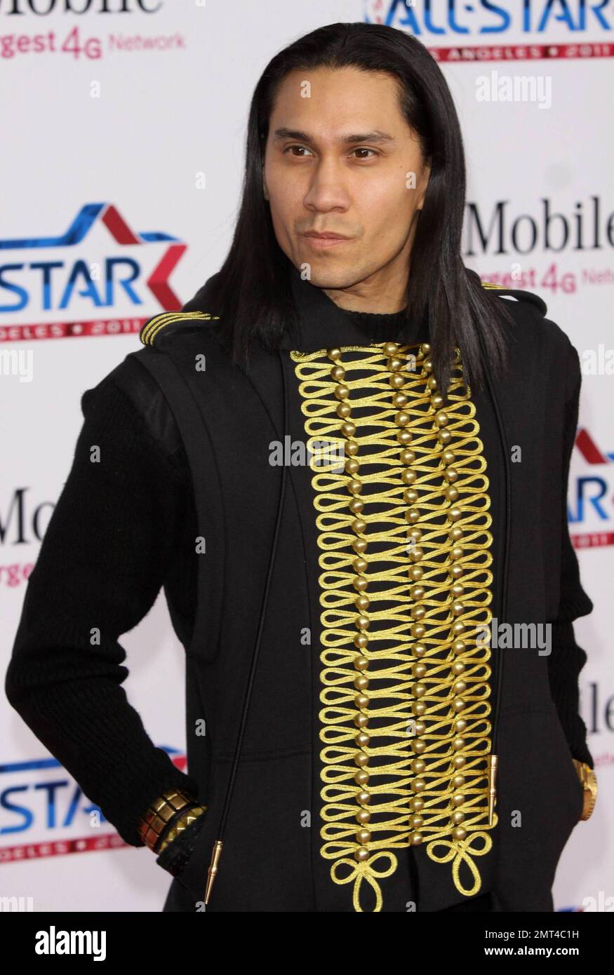 Musician Taboo poses for photographers on the pink carpet ahead of the ...