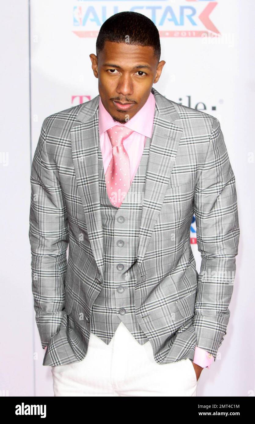 Singer Nick Cannon poses for photographers on the pink carpet ahead of ...