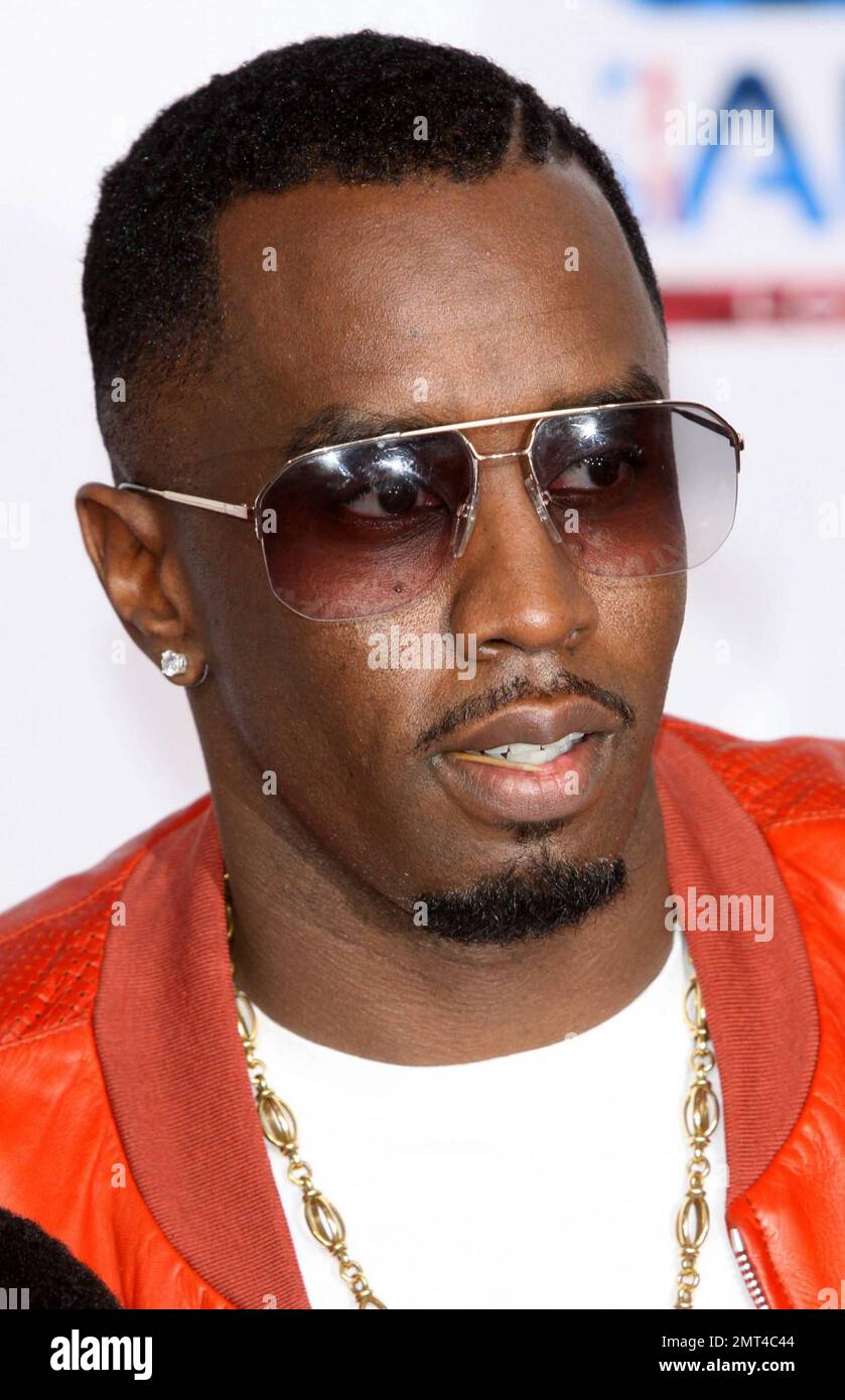 Sean Combs (aka Diddy) poses for photographers on the pink carpet ahead ...