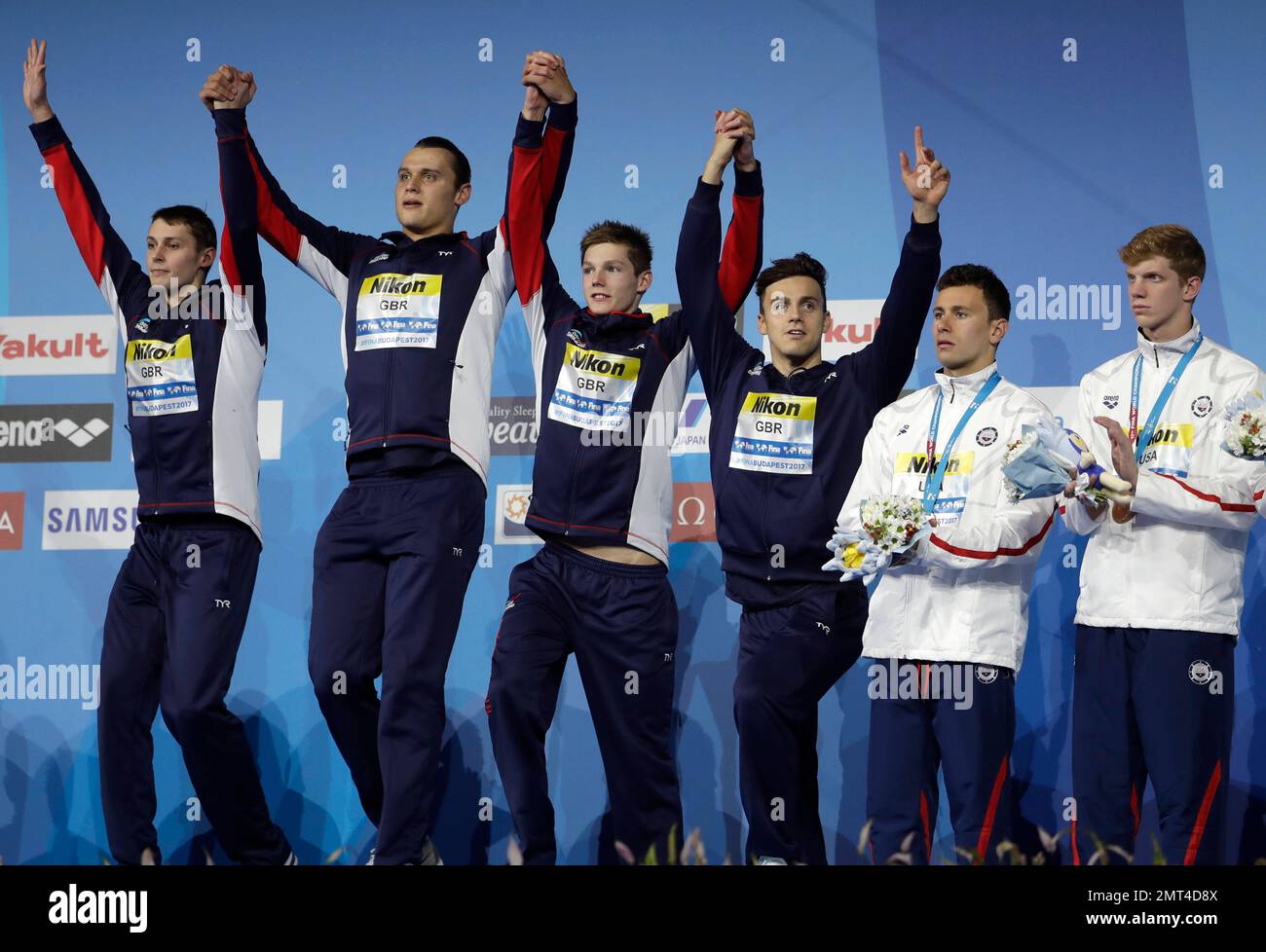 Britain's Stephen Milne, Nicholas Grainger, Duncan Scott and James Guy ...
