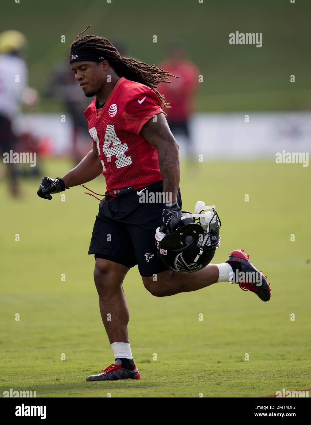 Atlanta Falcons running back Devonta Freeman (24) runs to a drill ...