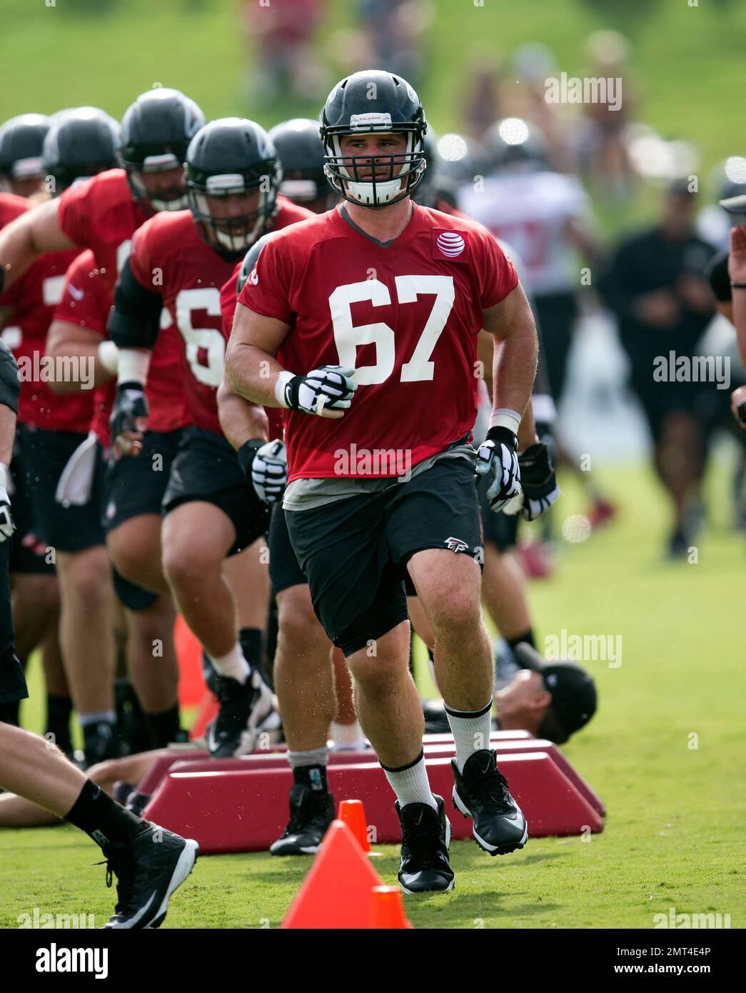 Atlanta Falcons guard Andy Levitre (67) runs drill during the team's ...