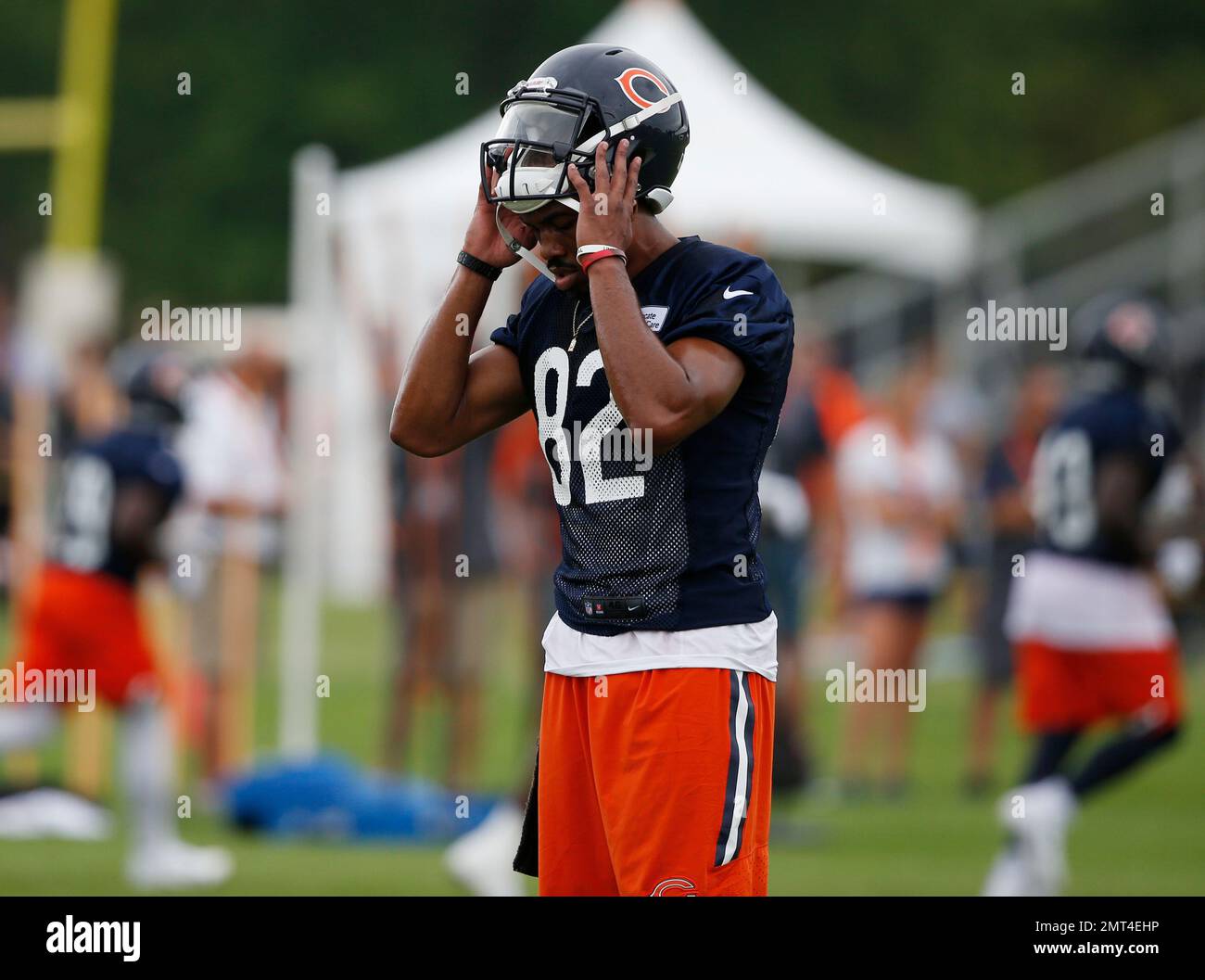 Chicago Bears wide receiver Rueben Randle puts his helmet on during an ...