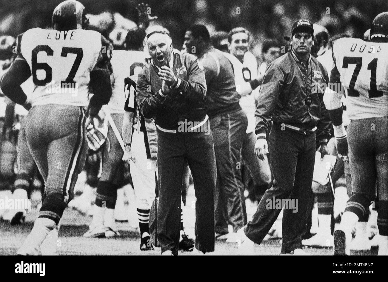 Los Angeles Rams head coach John Robinson, center, shows his approval ...