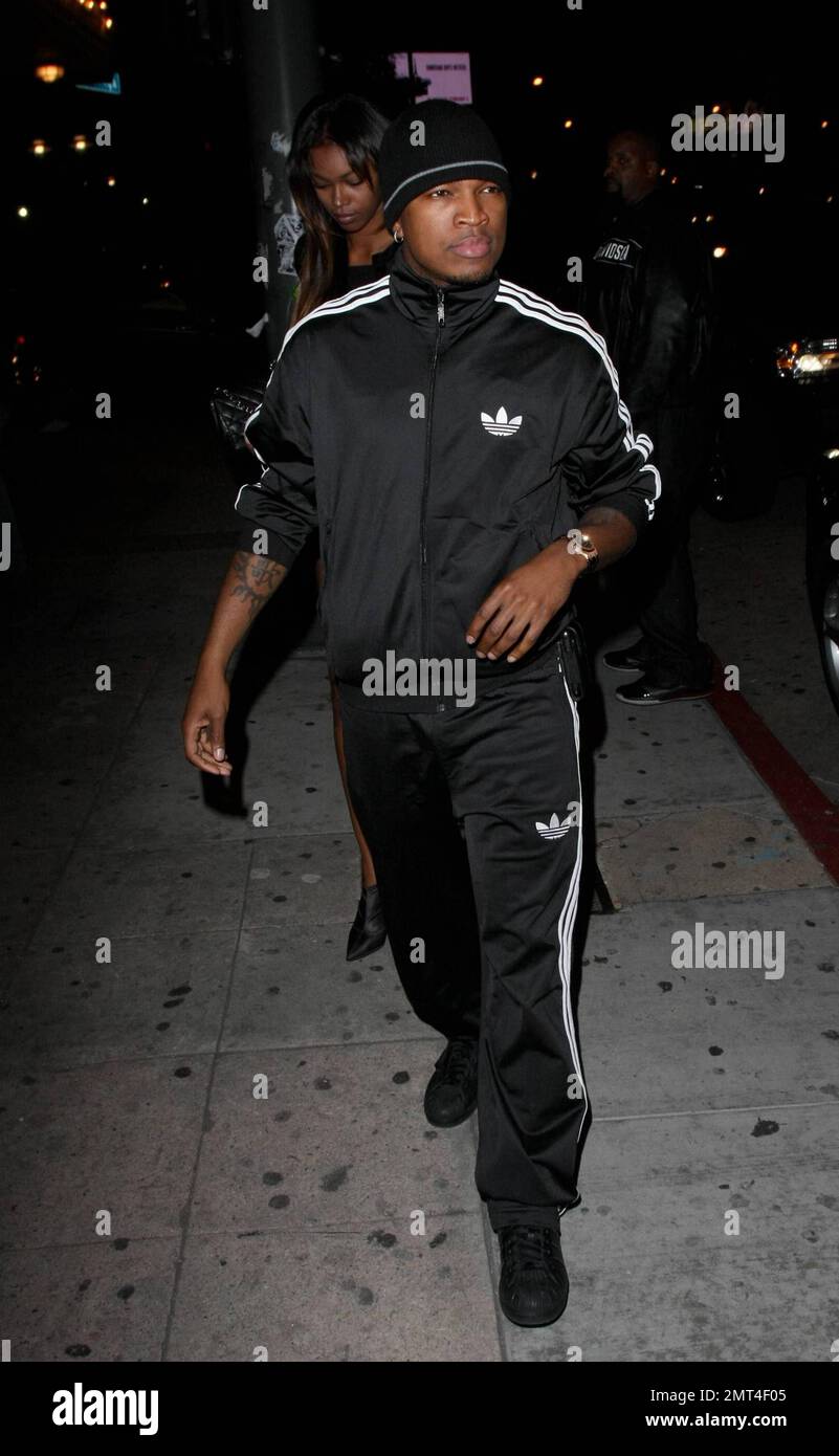 Rapper Ne-Yo and a female friend leave the RedZone Entertainment Pre ...