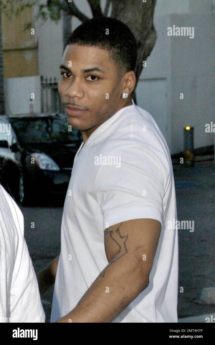 Nelly shops on Rodeo Drive the night before the Grammy Awards. Beverly ...