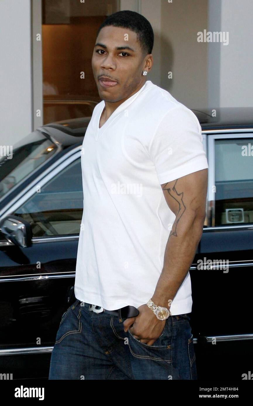 Nelly shops on Rodeo Drive the night before the Grammy Awards. Beverly ...