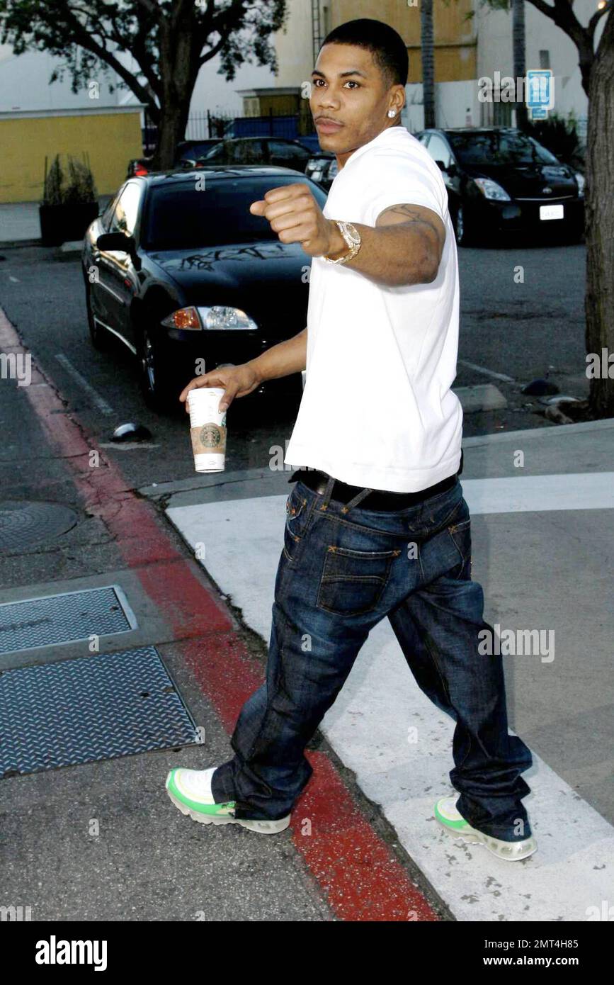 Nelly shops on Rodeo Drive the night before the Grammy Awards. Beverly ...