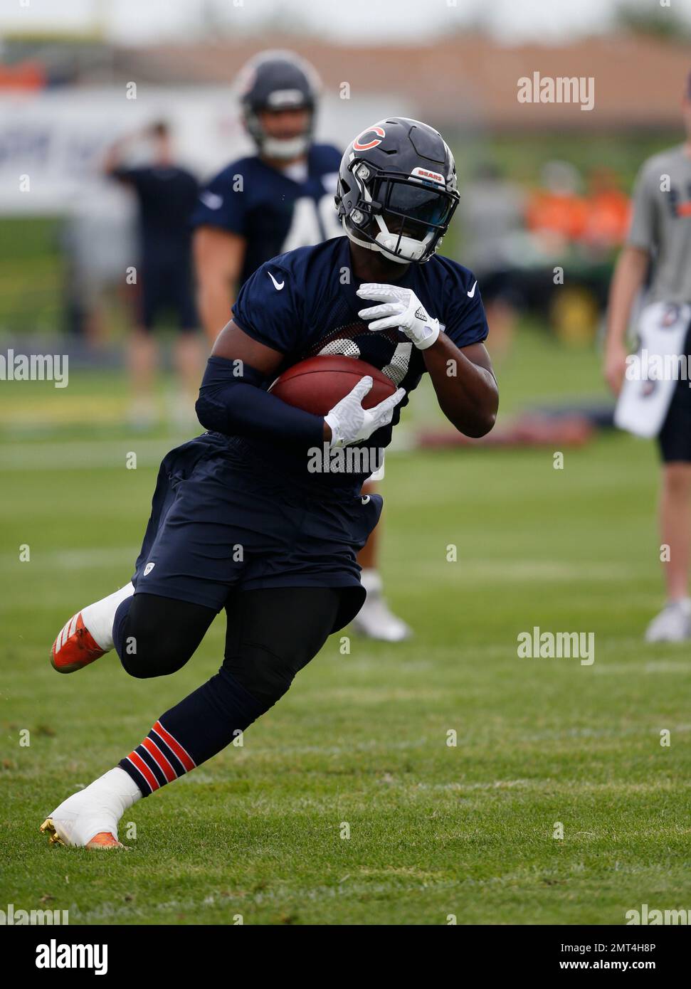 Chicago Bears running back Jordan Howard runs with a ball during an NFL ...