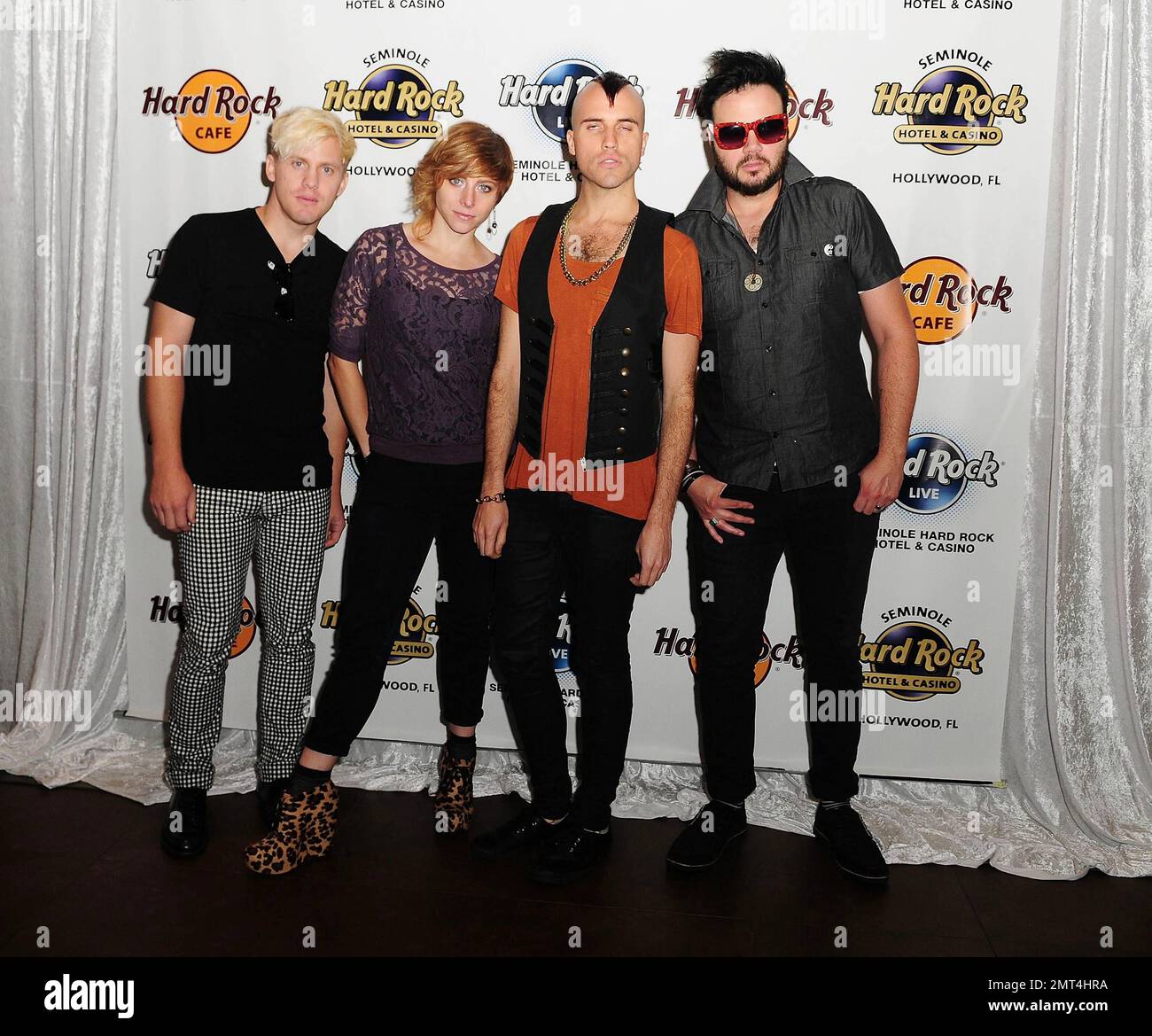 Alternative rock band Neon Trees sign a bass guitar and donate it to ...