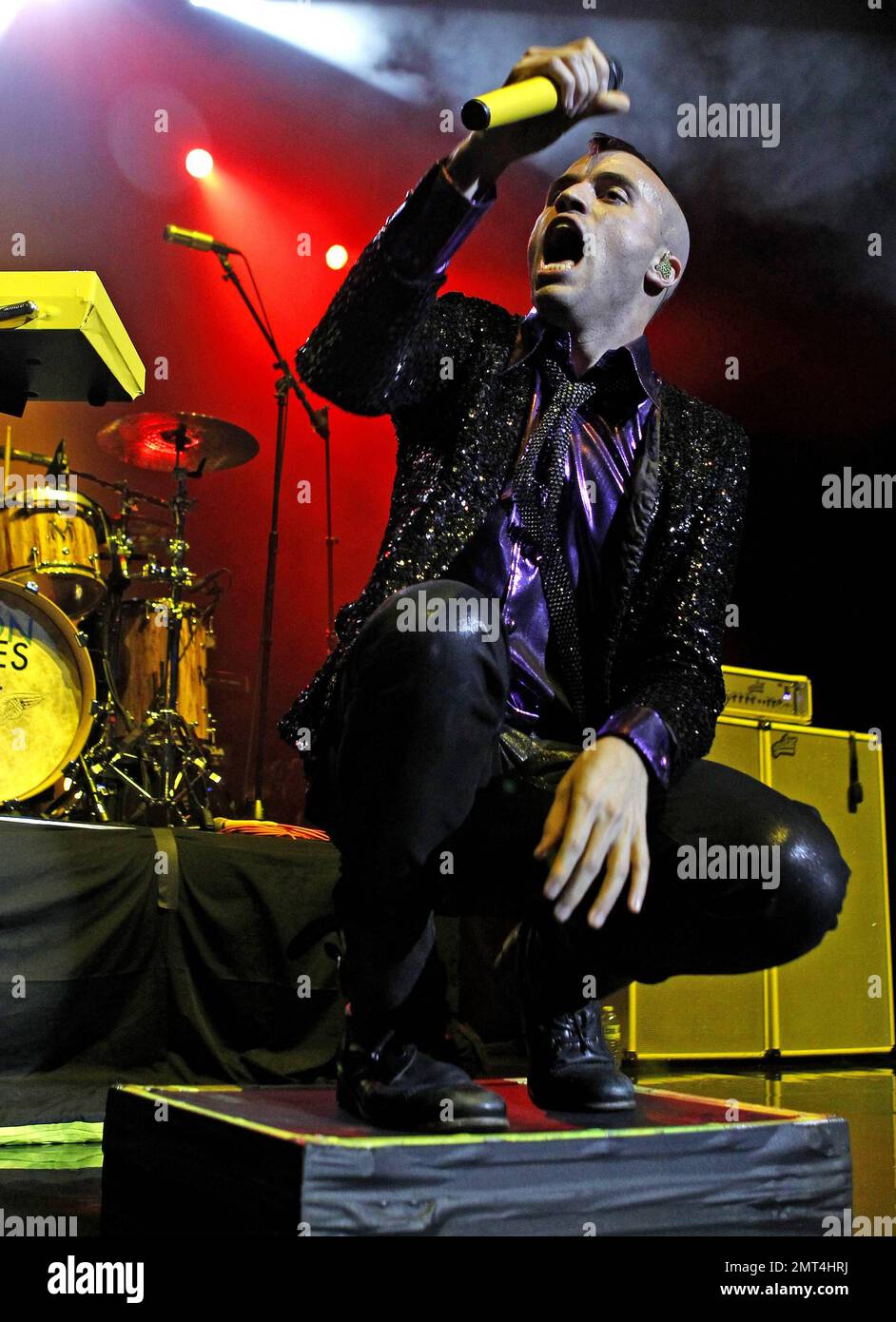 'Neon Tree's' lead vocalist Tyler Glenn performs with the rest of the ...